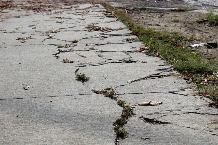 New plan to fund sidewalk repairs introduced to city council | Local ...