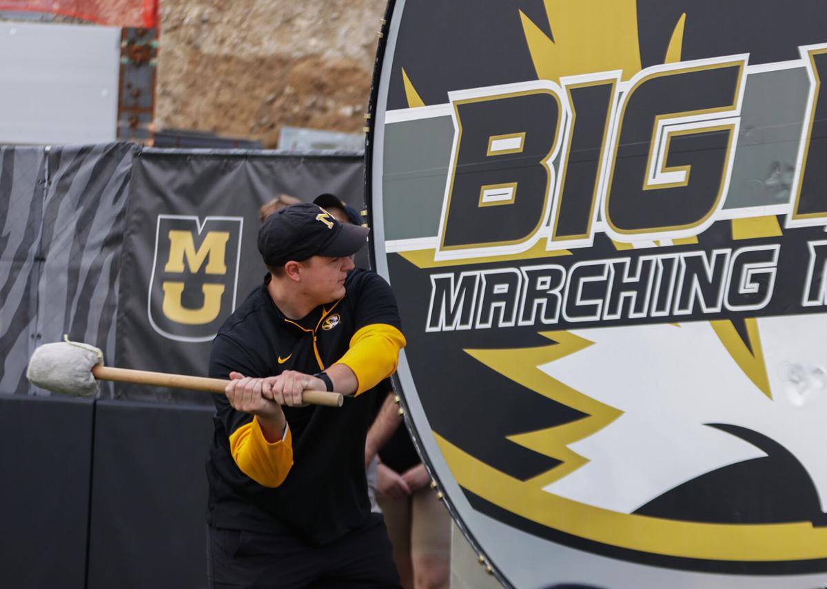 Former Mizzou kicker Harrison Mevis bangs the Big Mo drum ...