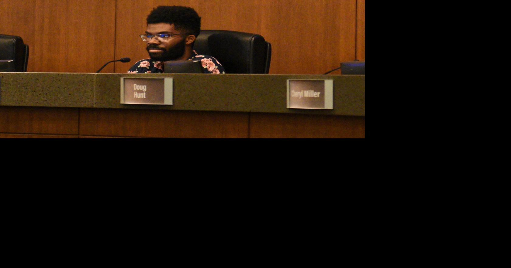 Reece Ellis gives his attention to a community speaker during the ...