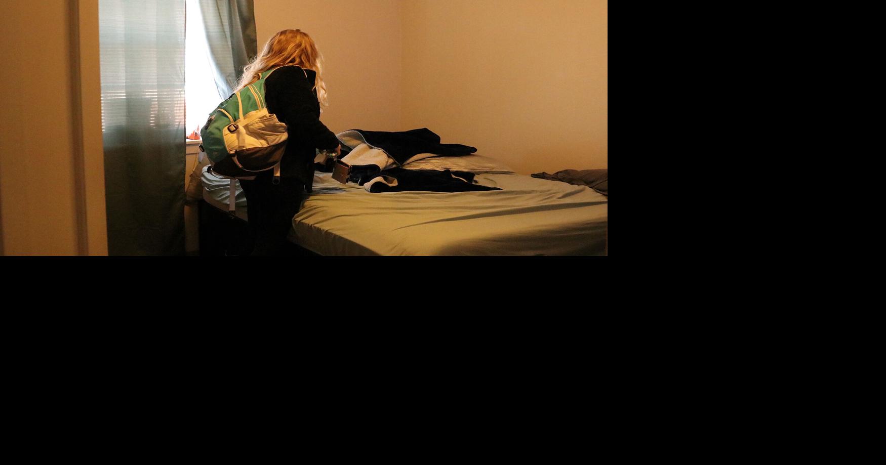 Amanda Shoemaker stands in her bedroom in Columbia Hall on Monday, Nov ...