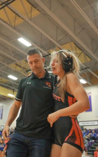 Jefferson City senior Kaylee Redcay, right, leans on her coach and ...