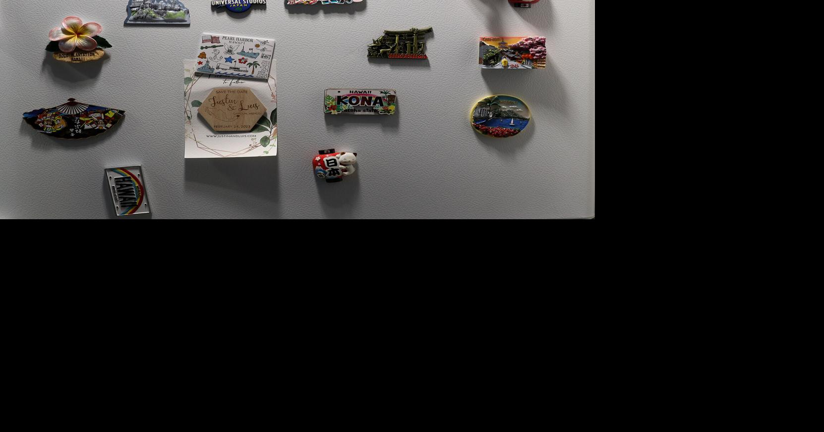 Magnets from Amanda Shoemaker’s travels hang on her fridge in Columbia ...