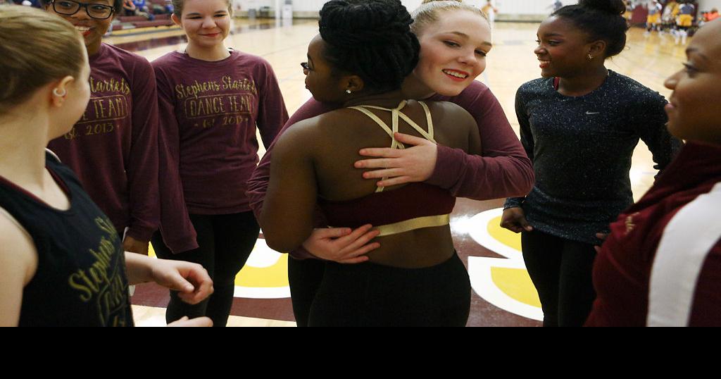 Freshman Kylie Thompson hugs senior Destiney Lockhart | Photos ...