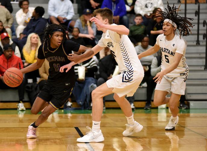 Battle boys basketball outpaces Hickman, advances to Class 6 District 7 ...