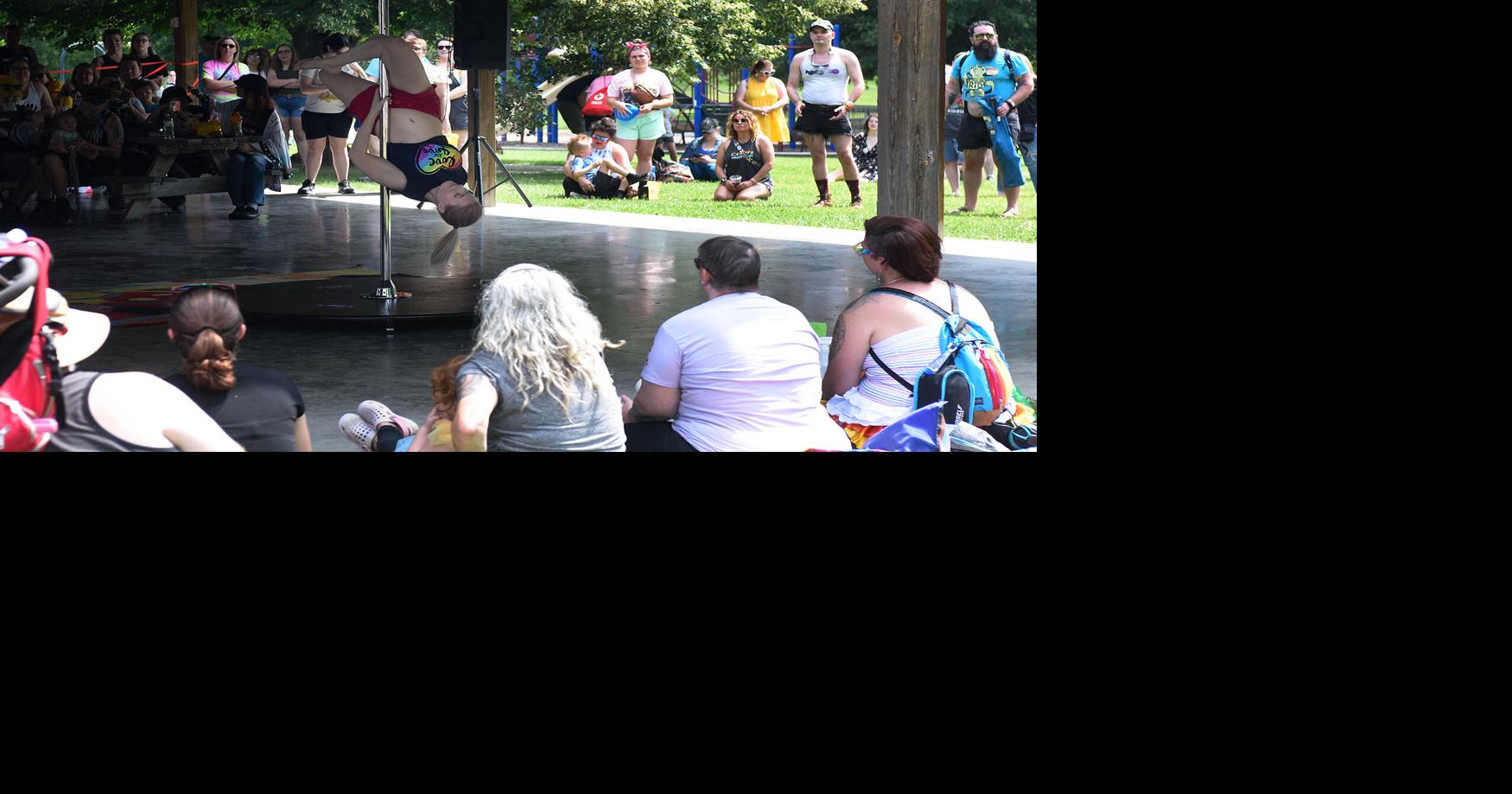 Community members gather to watch Muse Pole Fitness’ pole dancing ...