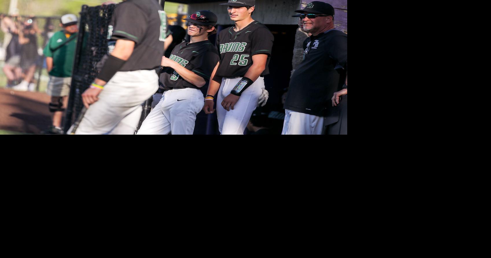 Rock Bridge’s Braedyn Boatright, center left, and Brady Davidson watch ...
