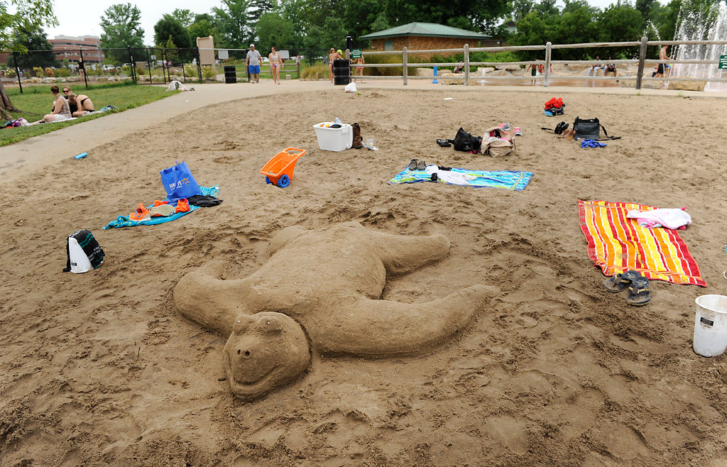 Life lessons in the sand: Family creates art at Stephens Lake Park ...