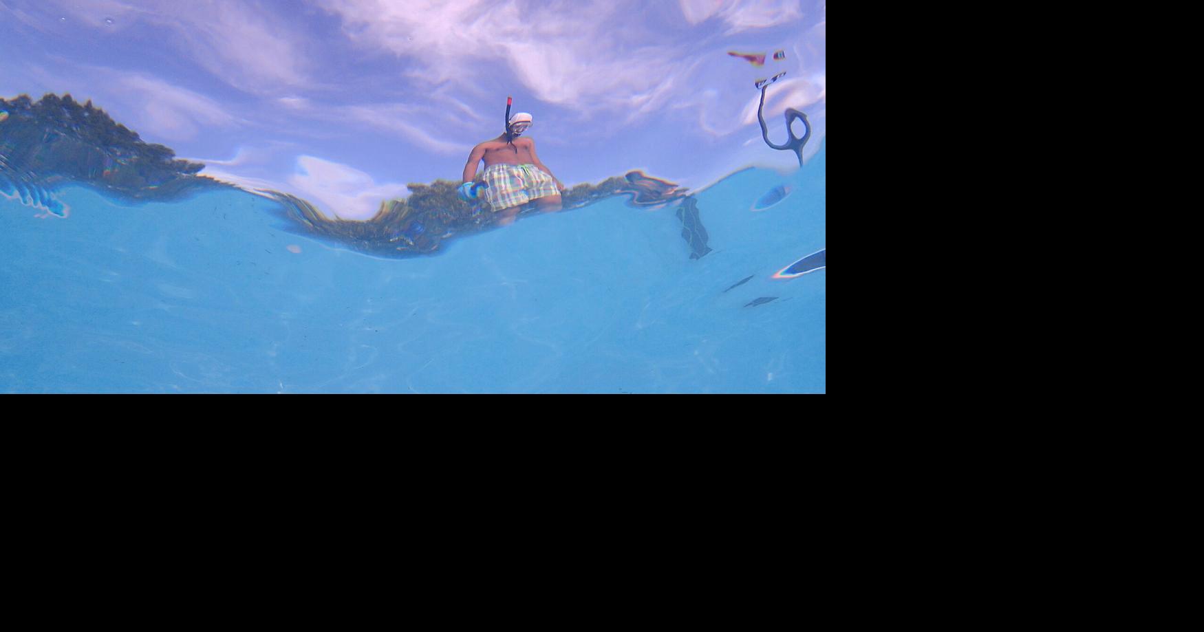 Sakil Mahmud prepares to dive into the water for underwater hockey ...