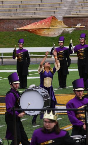 Marching to the beat: High school bands face off at Champion of ...