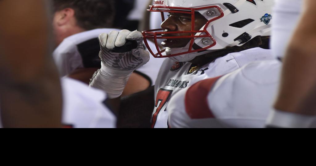 Ja'Chai Baker looks to his coach for advice | Photos ...