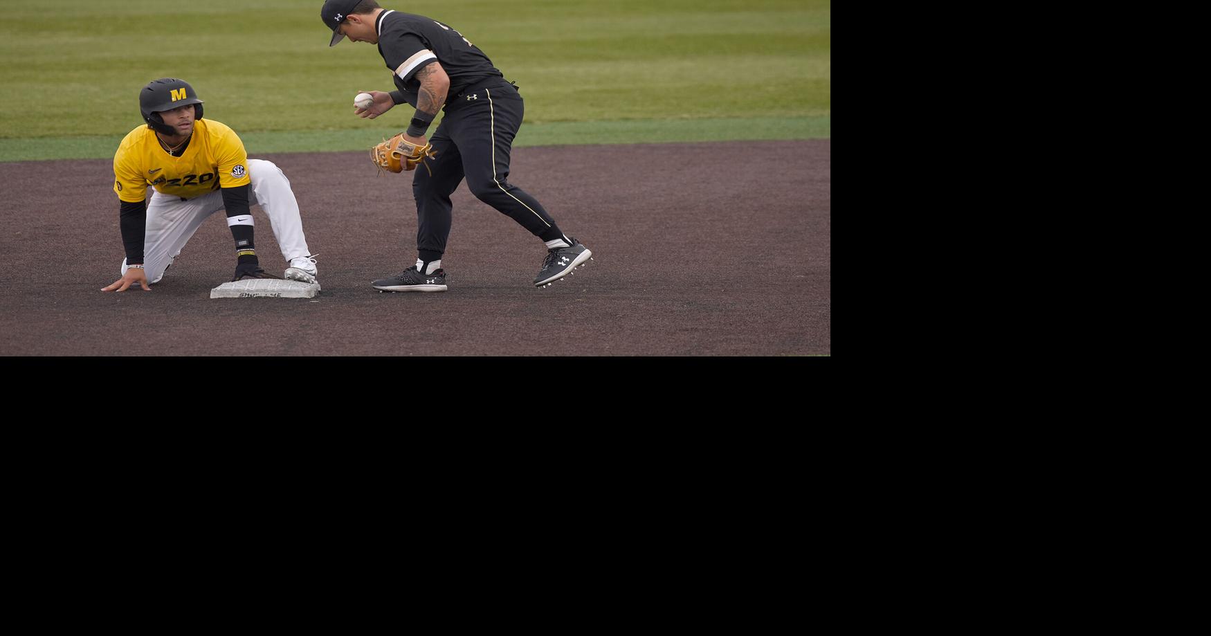 Matt Garcia, left, is called safe at second base before Lindenwood’s ...