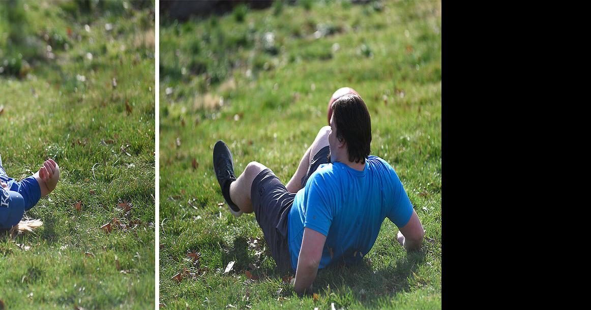 Sarah Muller, left, lays on the ground after colliding with Brendan ...