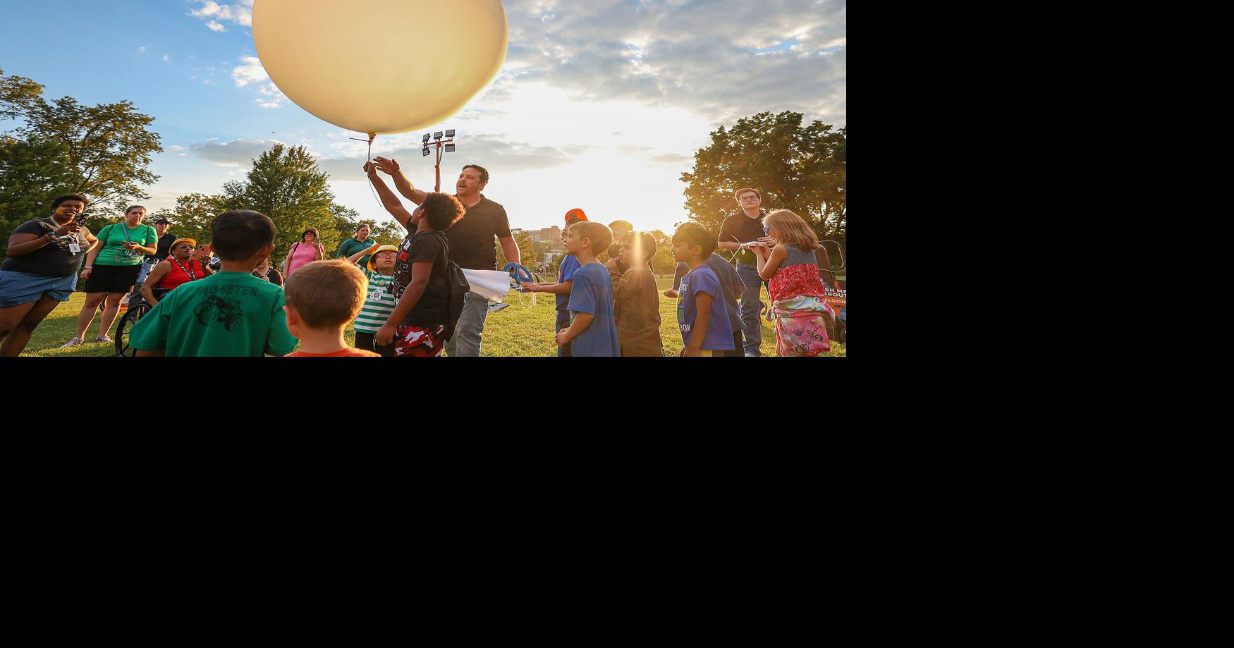 Christopher Steward walks kids and families through the launching of ...