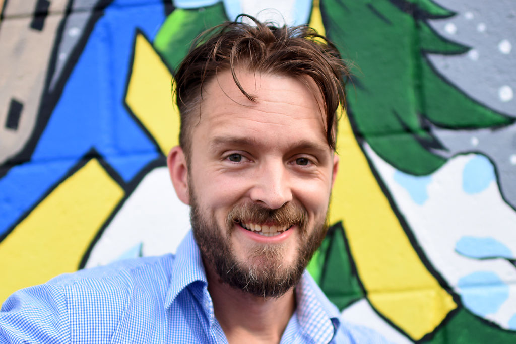 Colorful mural created by kids now brightens Downtown Optimist Club ...