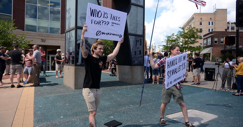 More than 100 people protest 'prohibition' before city meeting | Local ...