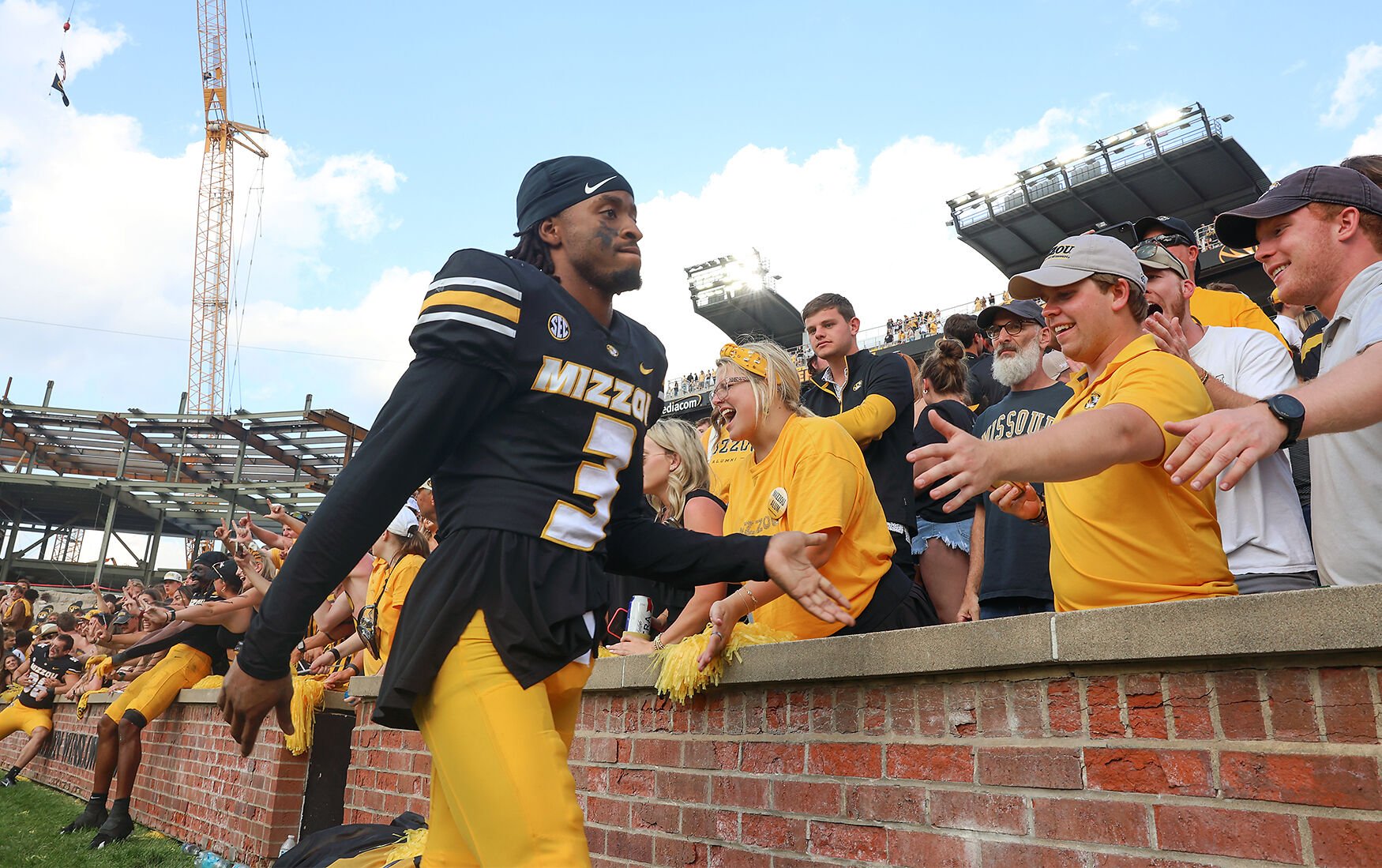 Mizzou wide receiver Kevin Coleman Jr. (3) low fives fans | Sports ...