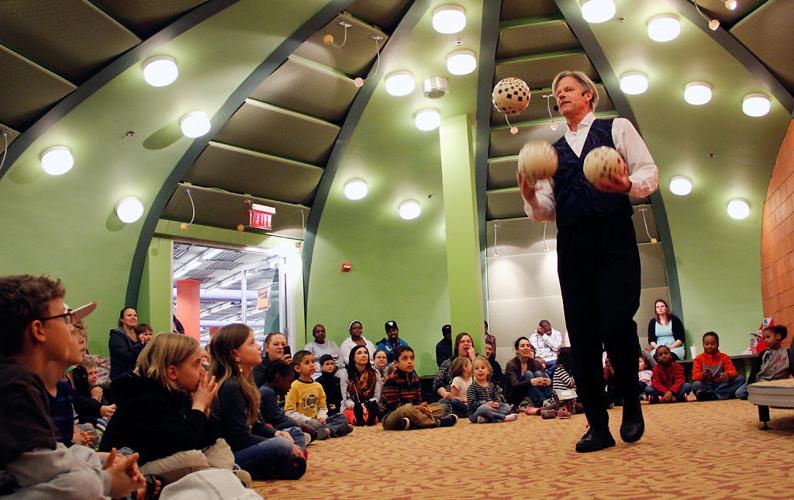 Juggler and comedian Brian Wendling performs at Columbia Public Library ...