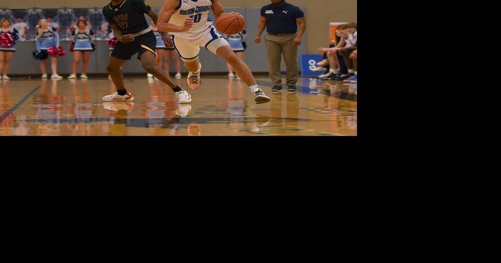 Jevon Porter stands tall in Tolton boys basketball's victory over ...
