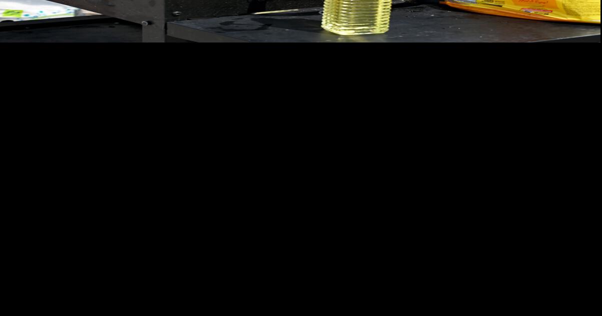 Jacob Prosper grills food Thursday | Sports | columbiamissourian.com