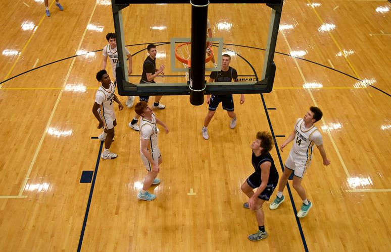 Rock Bridge boys basketball outlasts Grain Valley in 4OT district ...