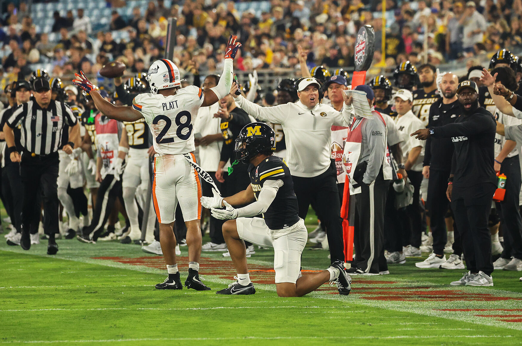 Mizzou wide receiver Donovan Olugbode (1) looks for a penalty flag ...