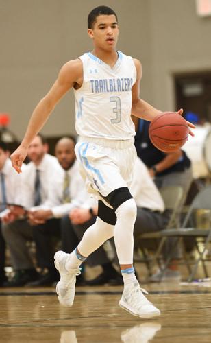 Coban Porter Dribbles The Ball Down The Court Photos