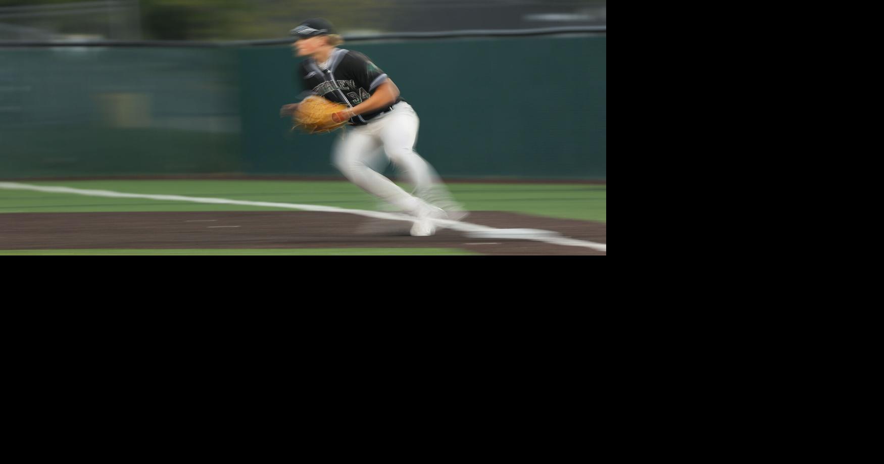 Staley First Baseman Chase Maddox runs to the bag to catch a throw to ...