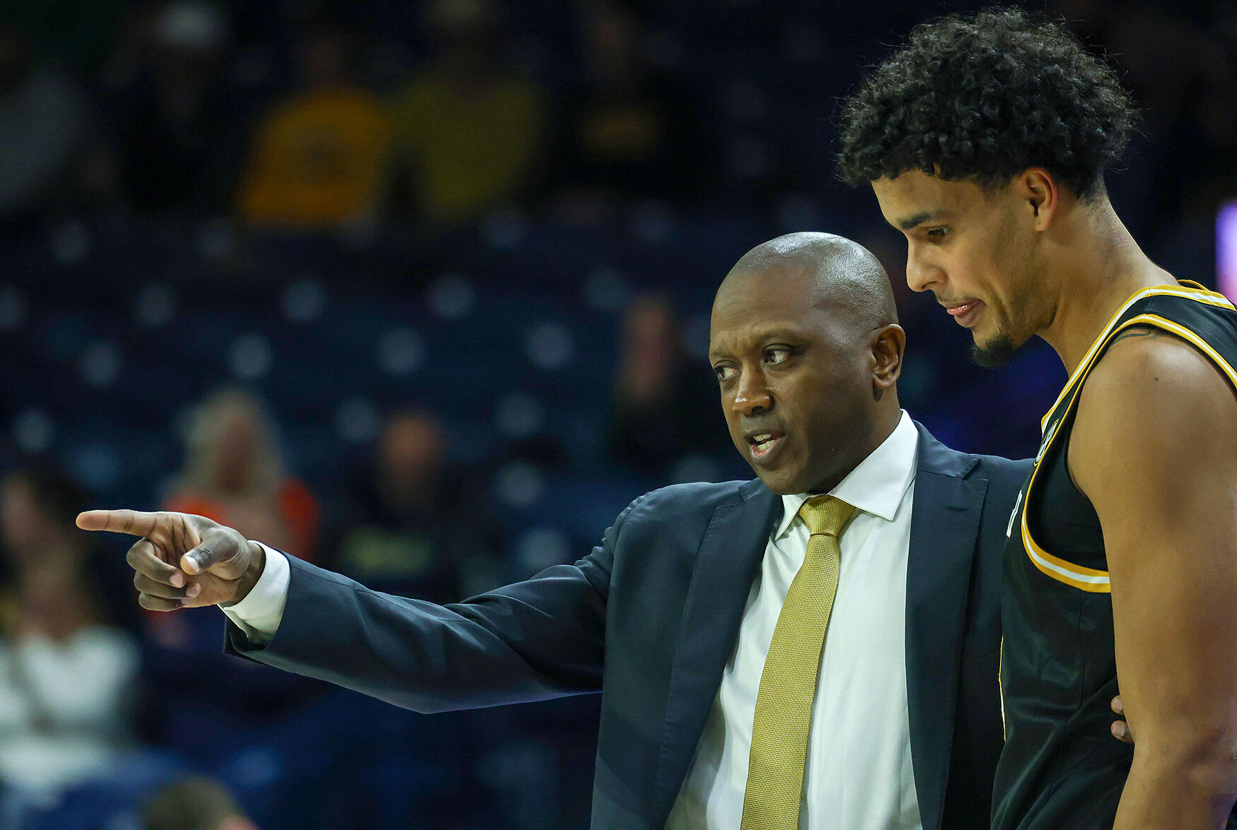 Mizzou head coach Dennis Gates coaches Mizzou forward Jevon Porter ...
