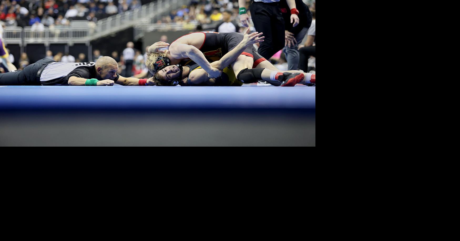 Maryland redshirt sophomore Ethen Miller attempts to pin Missouri ...