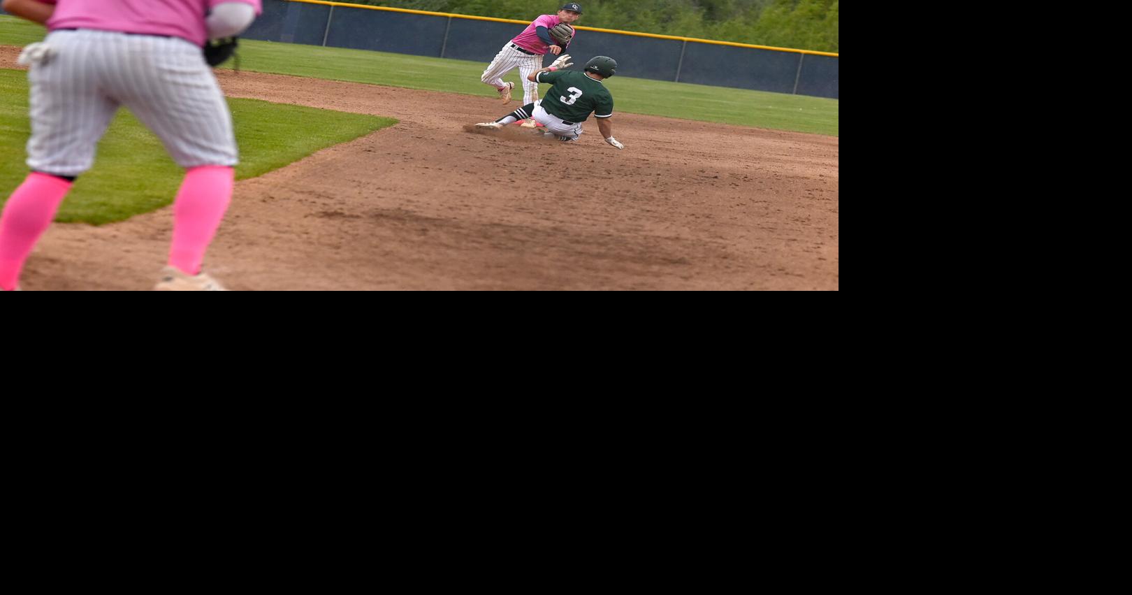 Columbia College second baseman Nick Fleckenstein, right, throws the ...