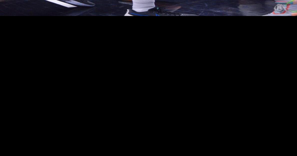 Vashon forward Nicholas Randall, left, and John Burroughs center ...