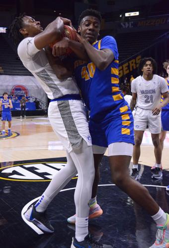 Vashon forward Nicholas Randall, left, and John Burroughs center ...