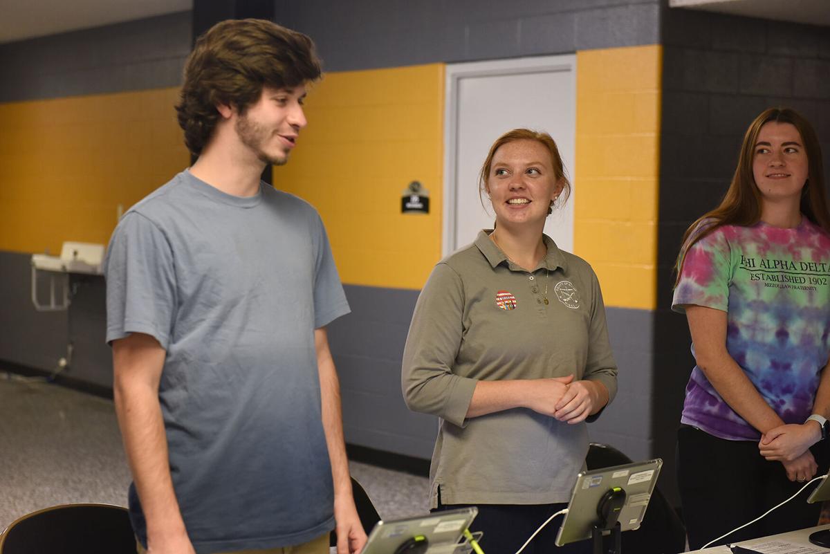 Ethan Dwyer, left, Mary Bean and Natalie Rausch play ice breaker games ...