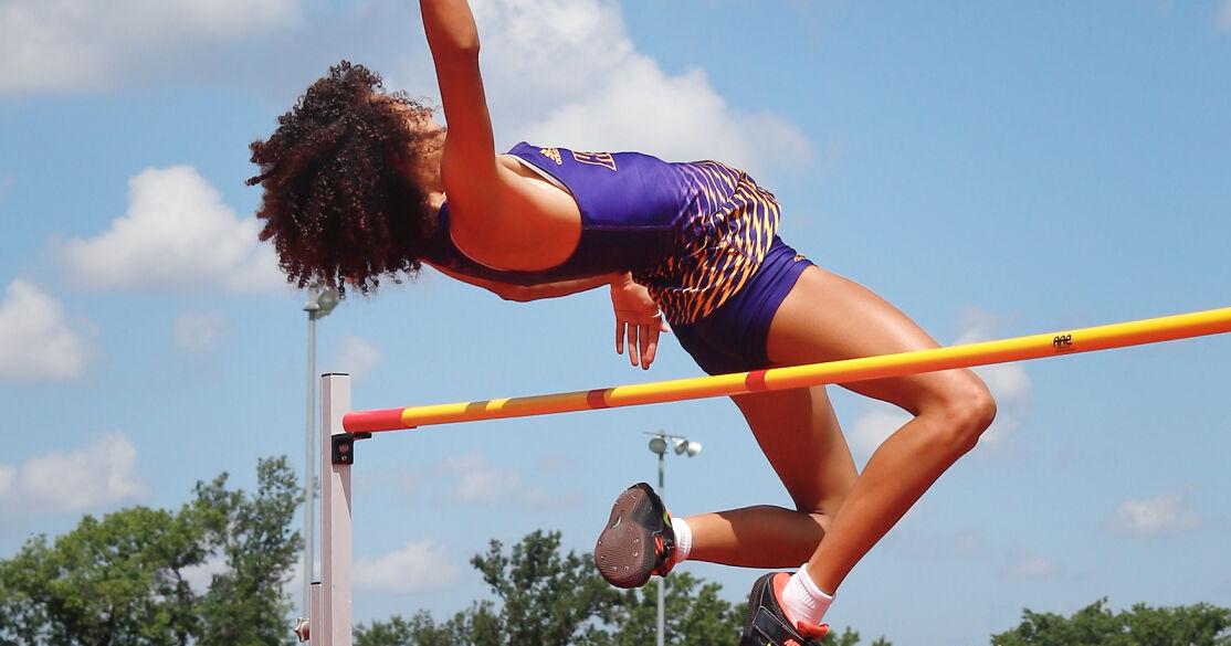 Hickman junior Athena Peterson competes in the class 5 girls high jump ...