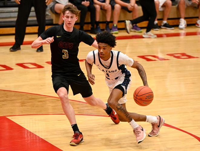 Tolton boys basketball falls short against Logan-Rogersville in MSHSAA ...