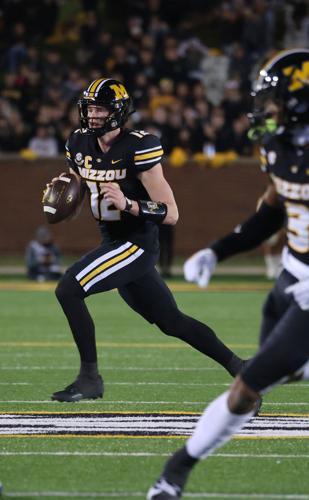 Mizzou’s quarterback Brady Cook runs the ball | Sports ...