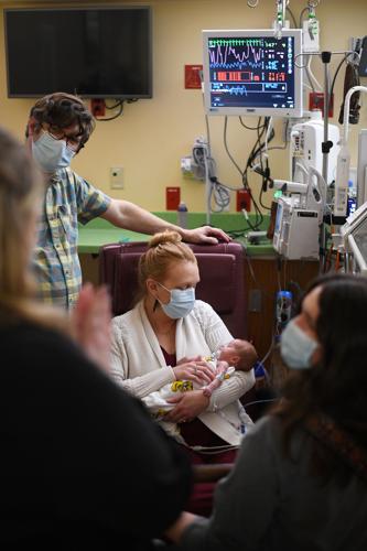 Benjamin Hook, left, watches as Emily Pivovarnik claps for Gabrielle ...