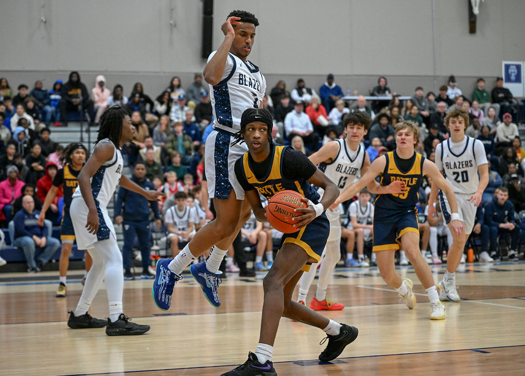 'A lot of grit': Tolton boys basketball survives crosstown rival Battle ...