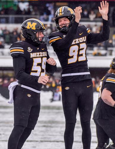 Mizzou’s Trey Flint and Mizzou’s Luke Bauer celebrate after a ...