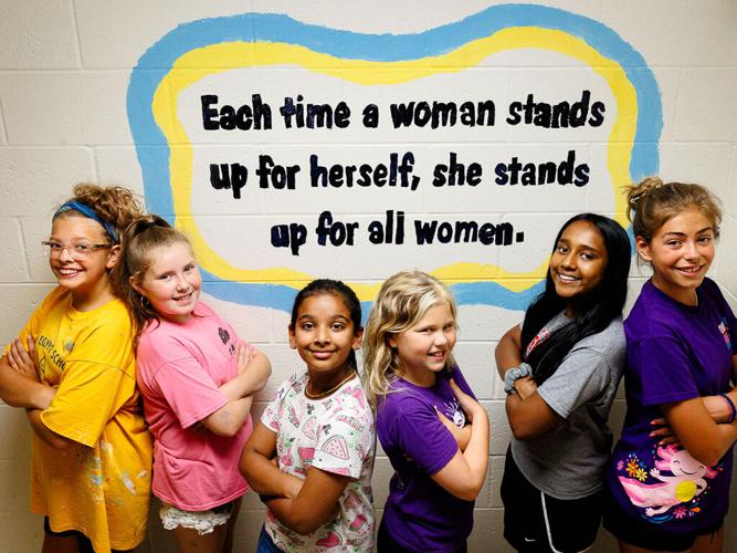 Girl scouts looks to inspire middle school with hallway art | Schools ...