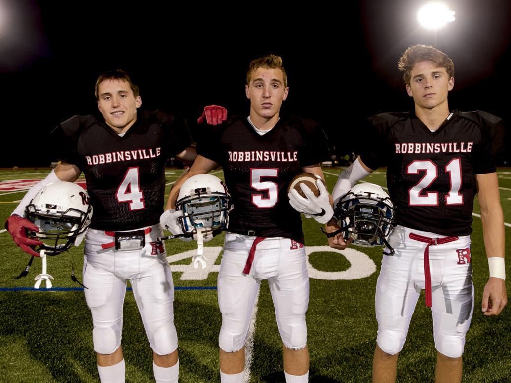 Triplets combine distinct abilities to lead Ravens football ...