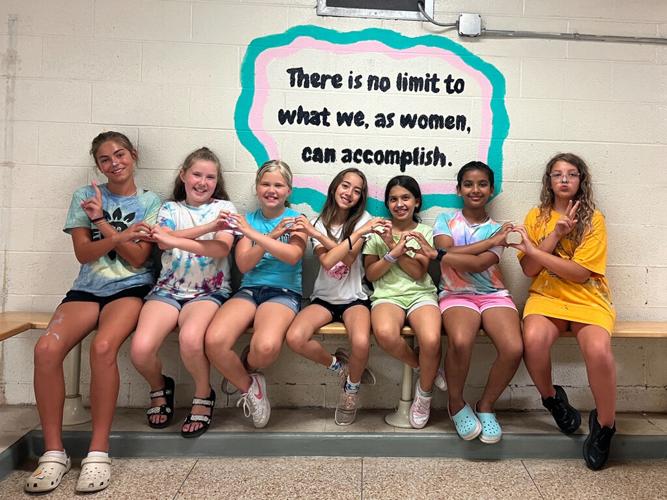 Girl scouts looks to inspire middle school with hallway art | Schools ...