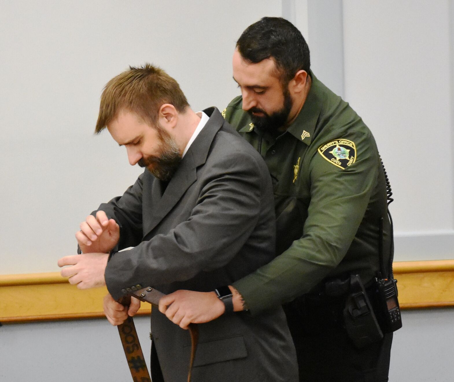 A member of the Coos County Sheriff's Office takes convicted murderer ...