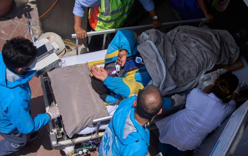 Sherpa guide missing for a week on Mount Everest rescued while crawling ...