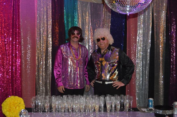 Aquin goes disco at fundraiser gala | News | cpioneer.com