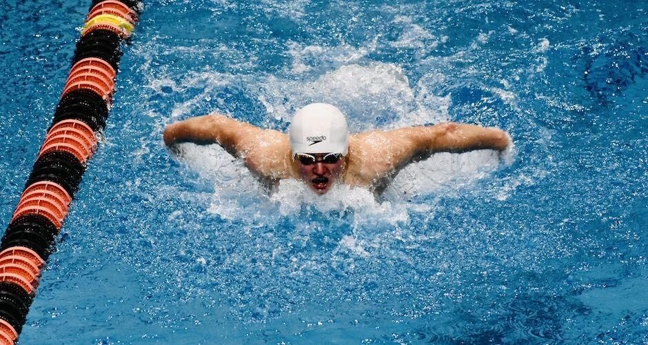 Monday swimming: Kunsman sets fly record in season-opening meet with ...