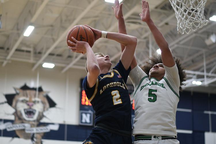 D-III district boys basketball: Miles powers Emmanuel past Archbold, 62 ...