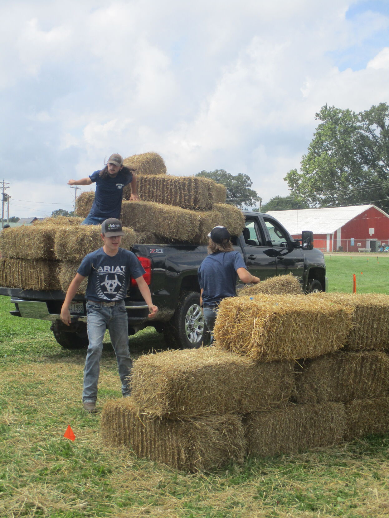 Stack'em up with the straw loading contest | Fairs | crescent-news.com