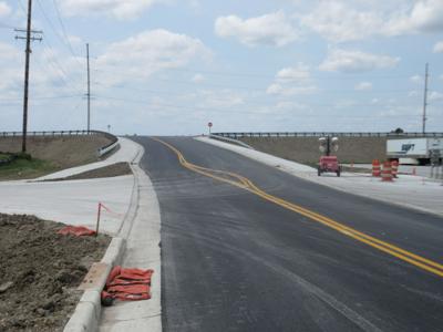 New stretch of Commerce Drive from Carpenter Road is paved | Local News ...