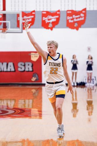 D-III district boys basketball: Wagner trey helps O-G rally past ...